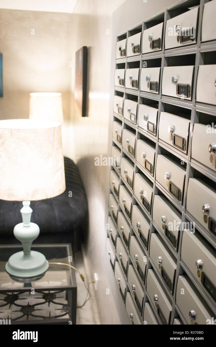 Residential appartment block building interior letter boxes with ...