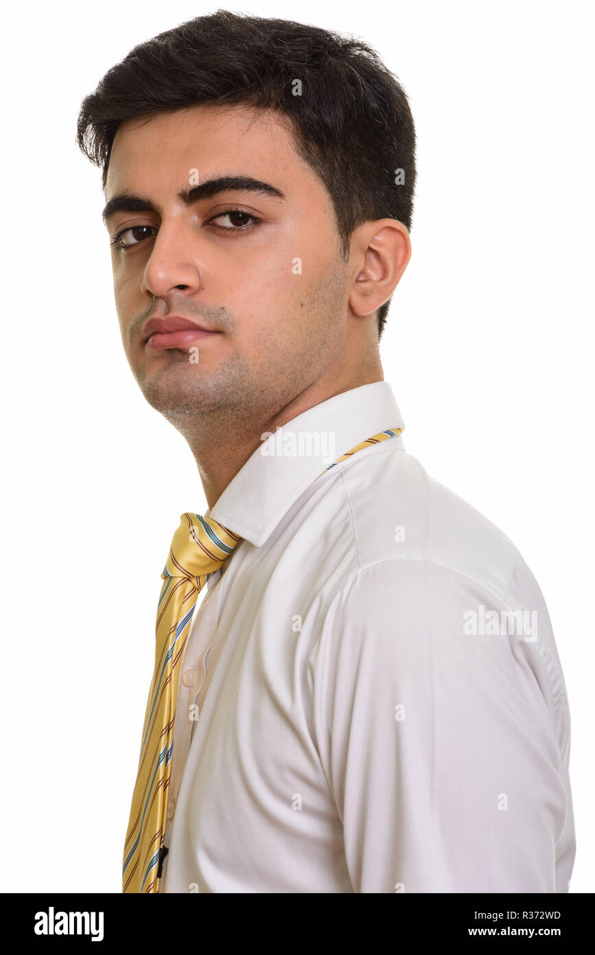 Face of young handsome Persian businessman looking at camera Stock ...
