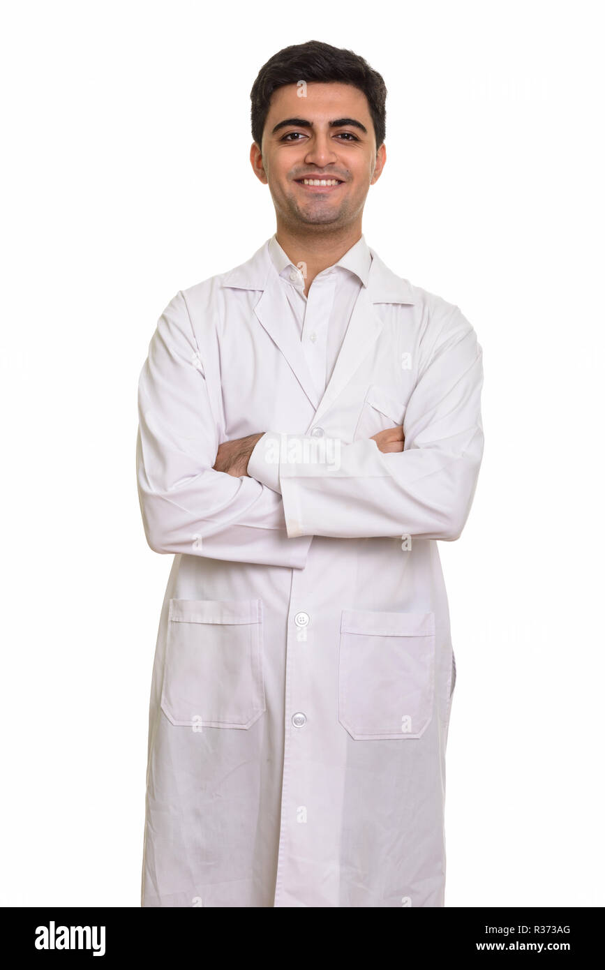 Young happy Persian man doctor smiling with arms crossed Stock Photo ...