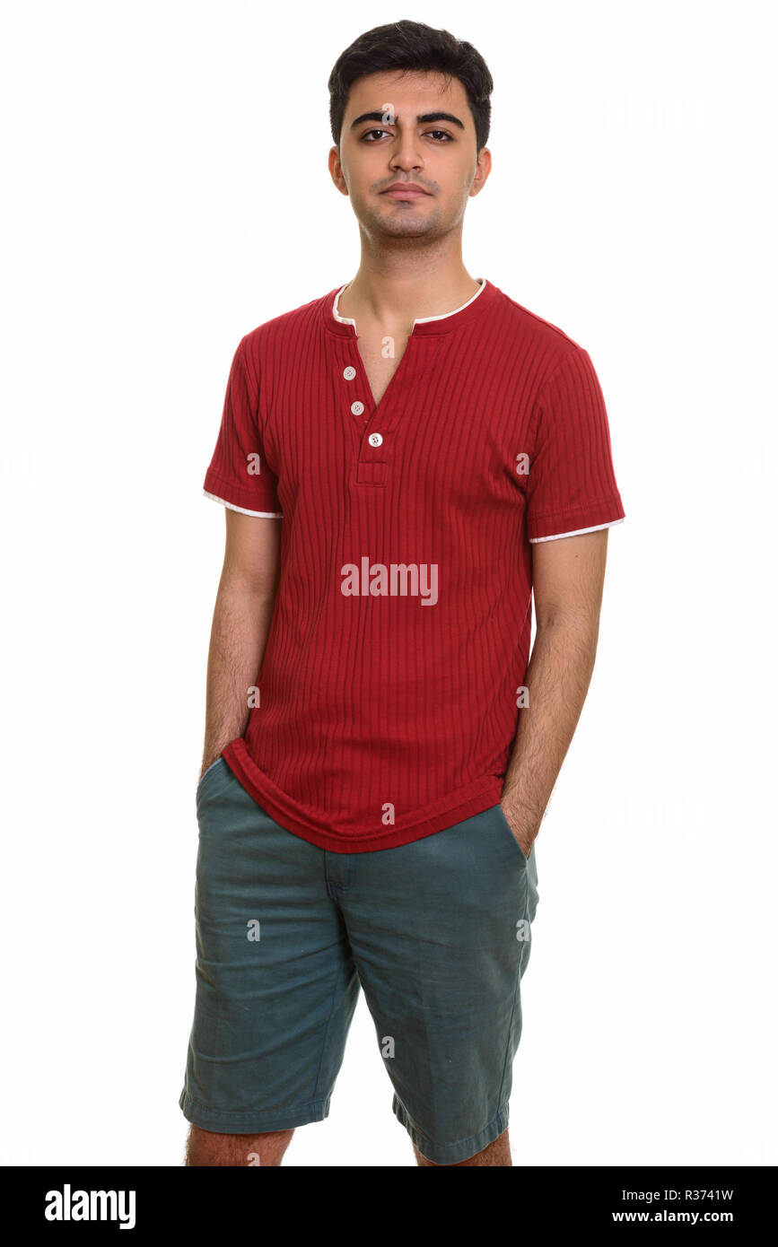 Young handsome Persian man looking at camera Stock Photo - Alamy