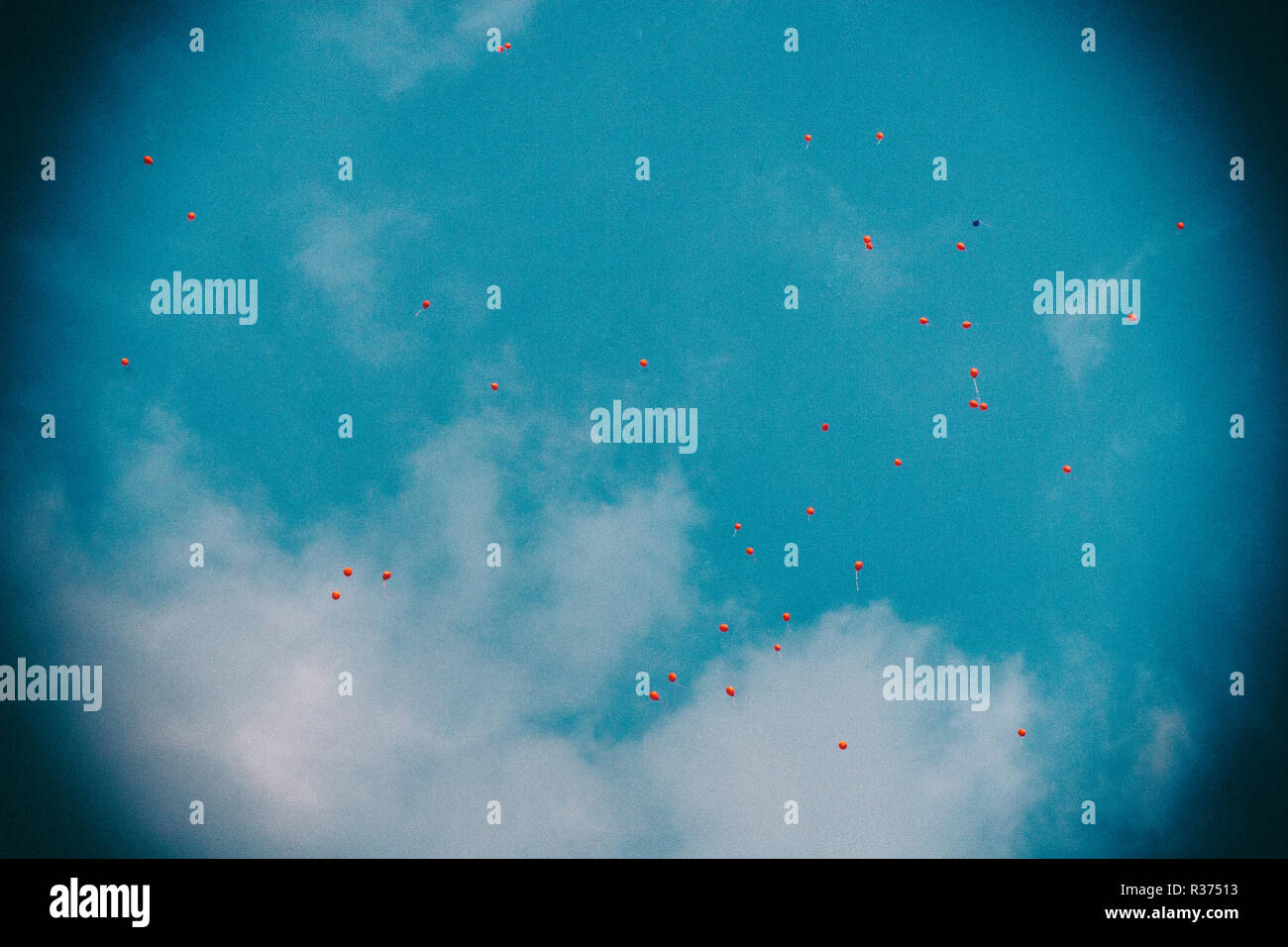 Wallpaper background of a red balloons flying in the blue sky with ...