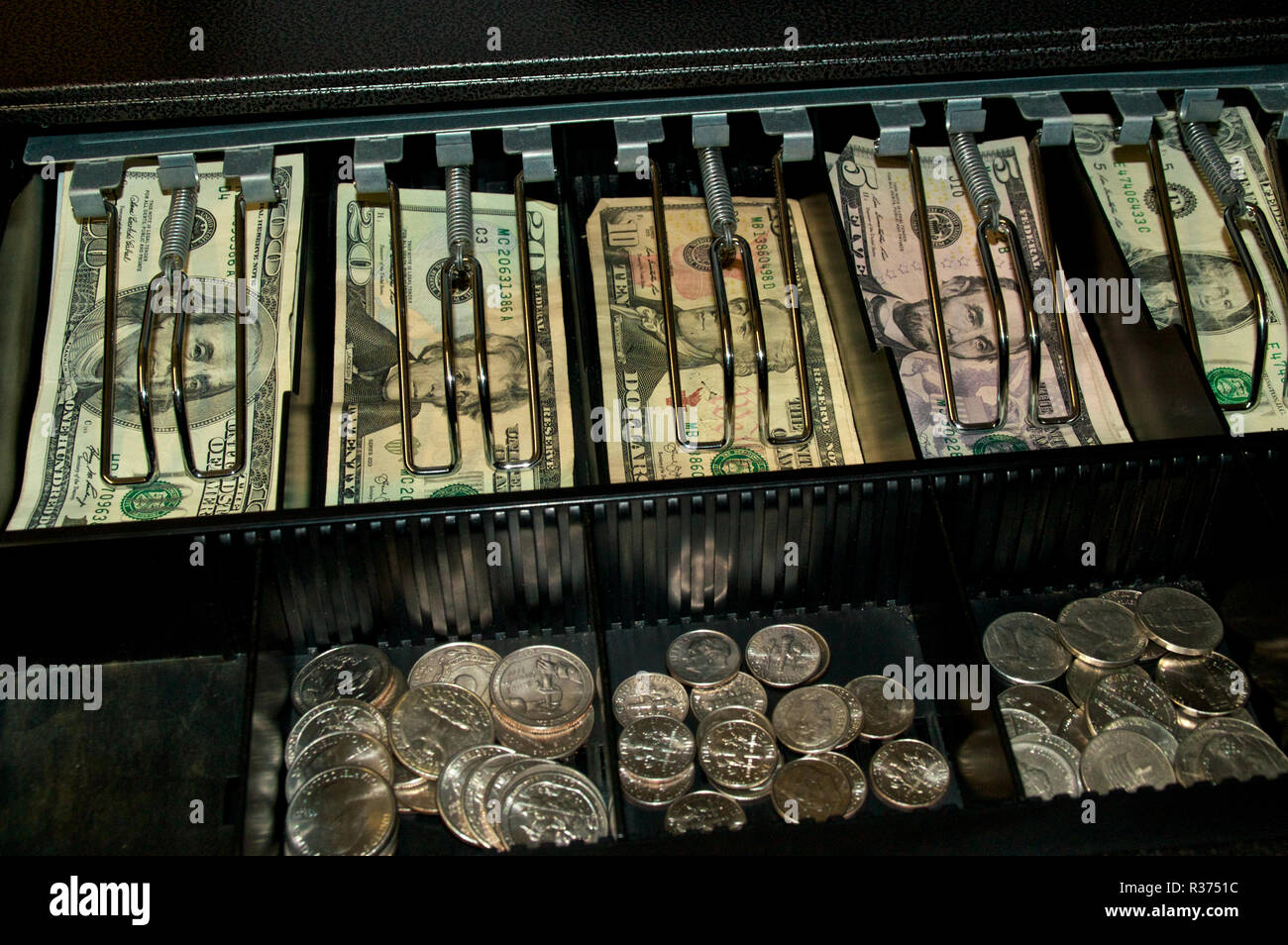 Change us currency cashier hi-res stock photography and images - Alamy