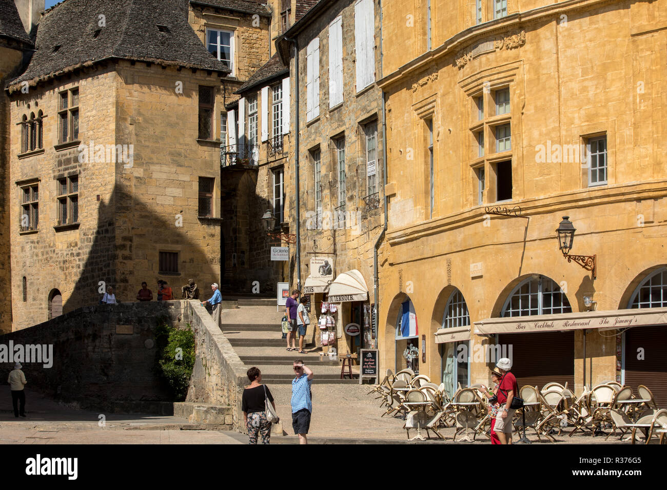 Sarlat, France - September 2, 2018: Historic houses surrounding Place ...