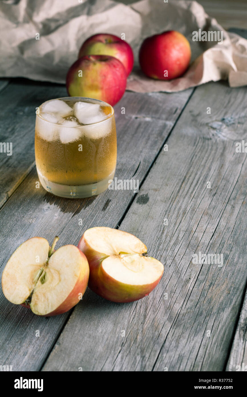 Sliced apples and a glass of fresh juice Stock Photo - Alamy
