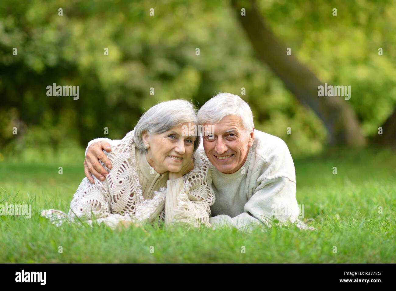 Portrait of cute elderly couple in nature Stock Photo - Alamy