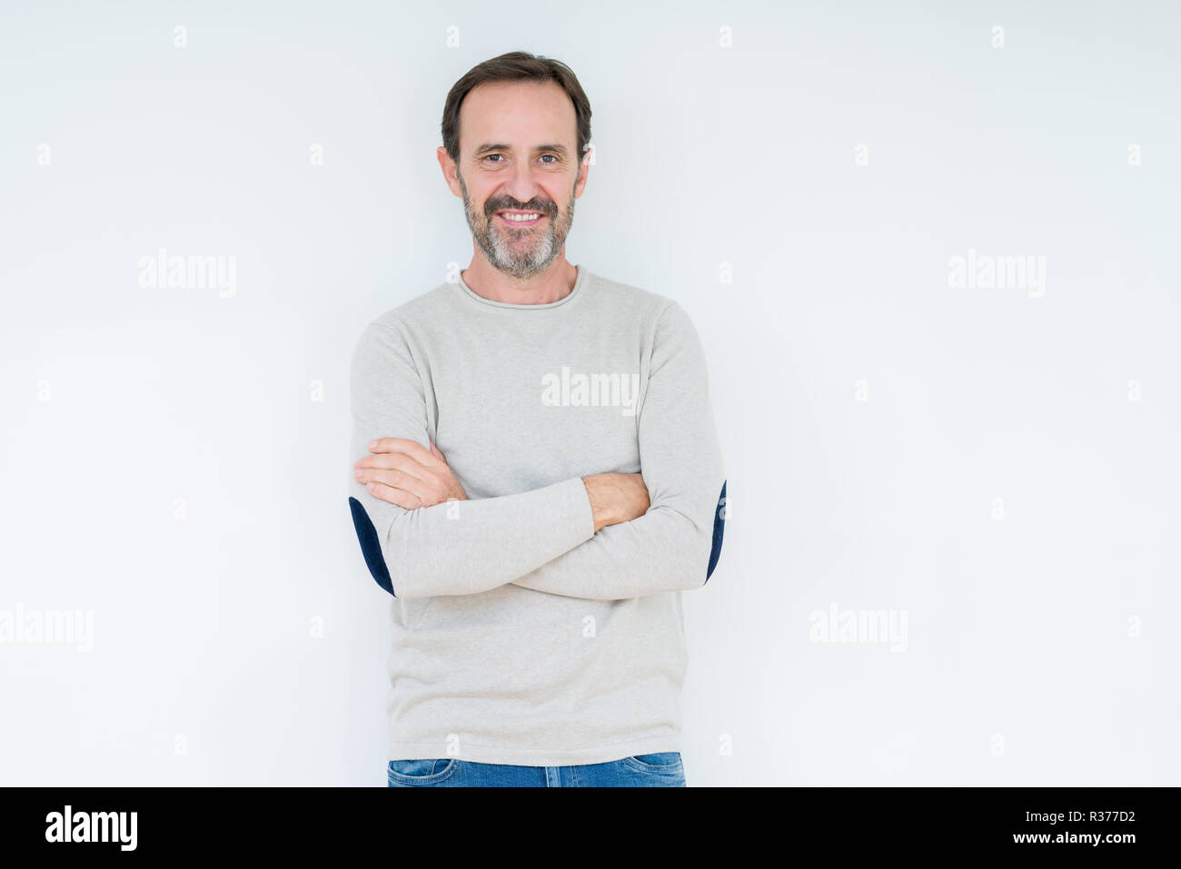 Elegant senior man over isolated background happy face smiling with ...