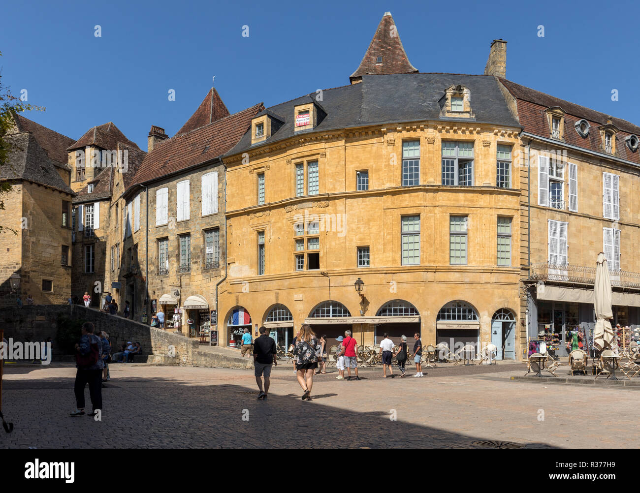 Sarlat, France - September 2, 2018: Historic houses surrounding Place ...