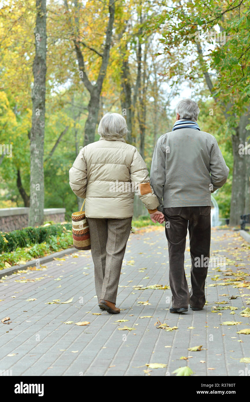 Senior citizens walk in park hi-res stock photography and images - Alamy