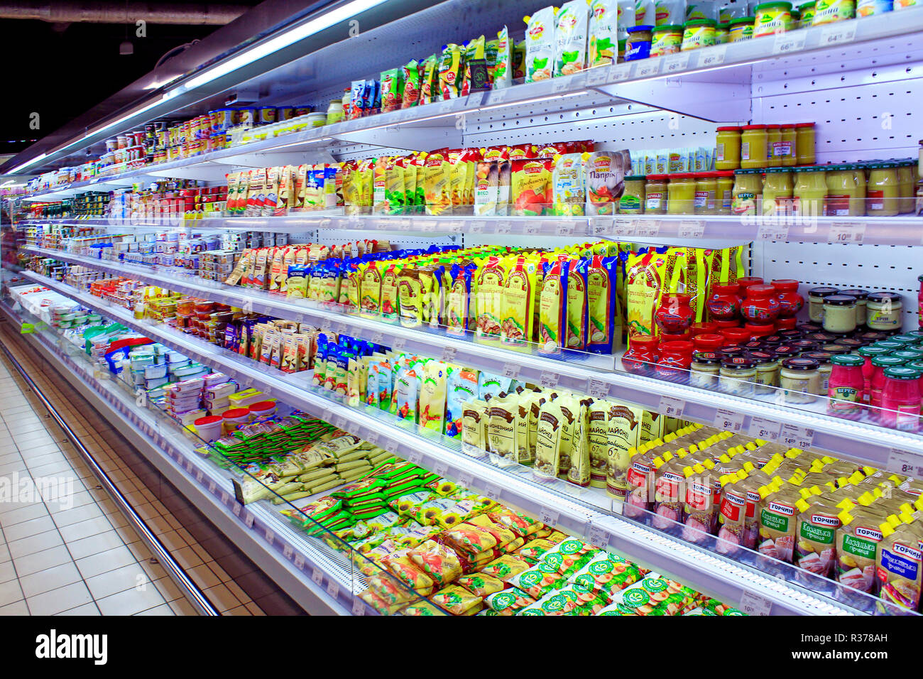 Milk yogurts and others dairy production on shelves of shop. Shop of ...