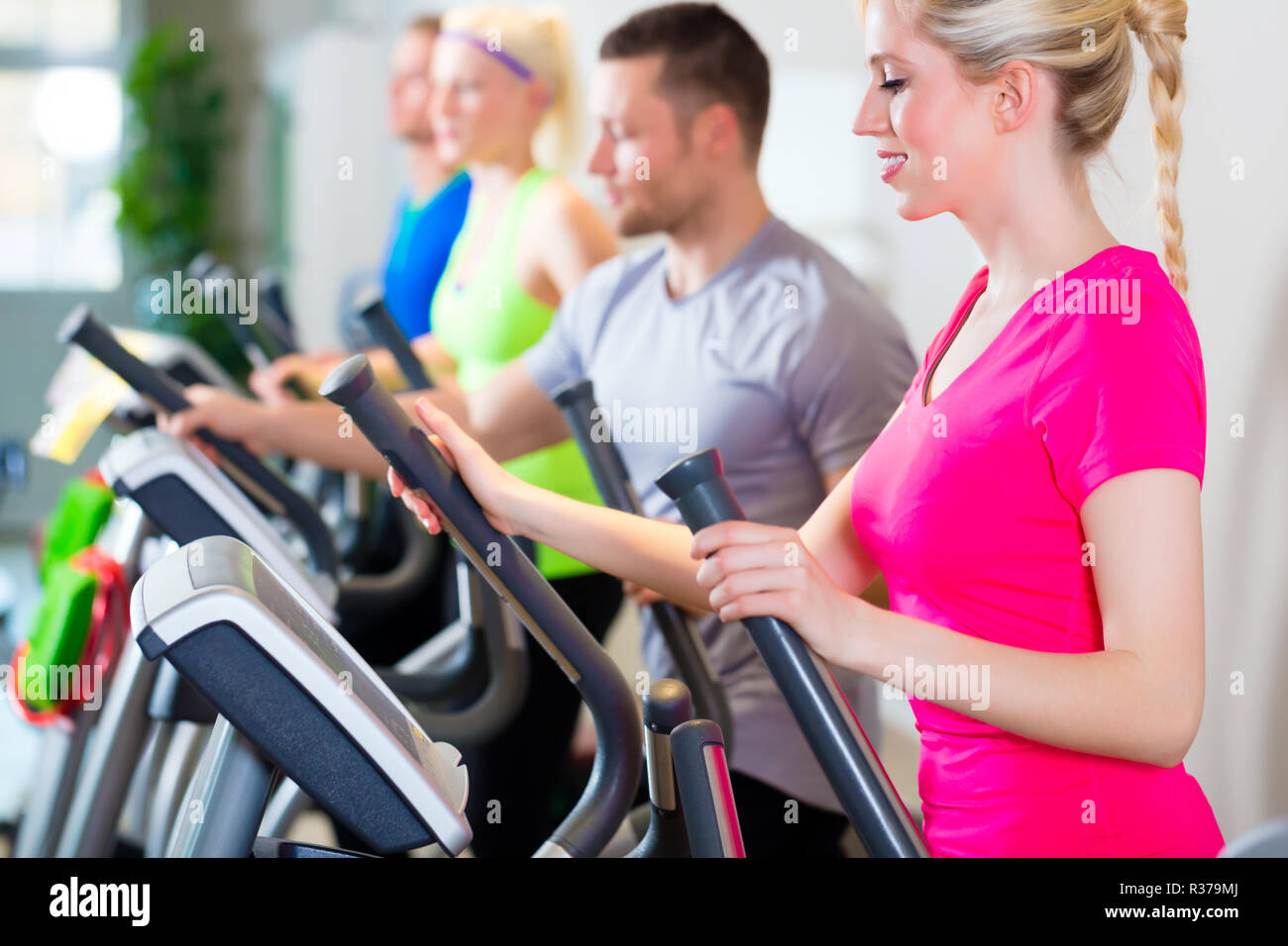 people on treadmill in gym Stock Photo - Alamy
