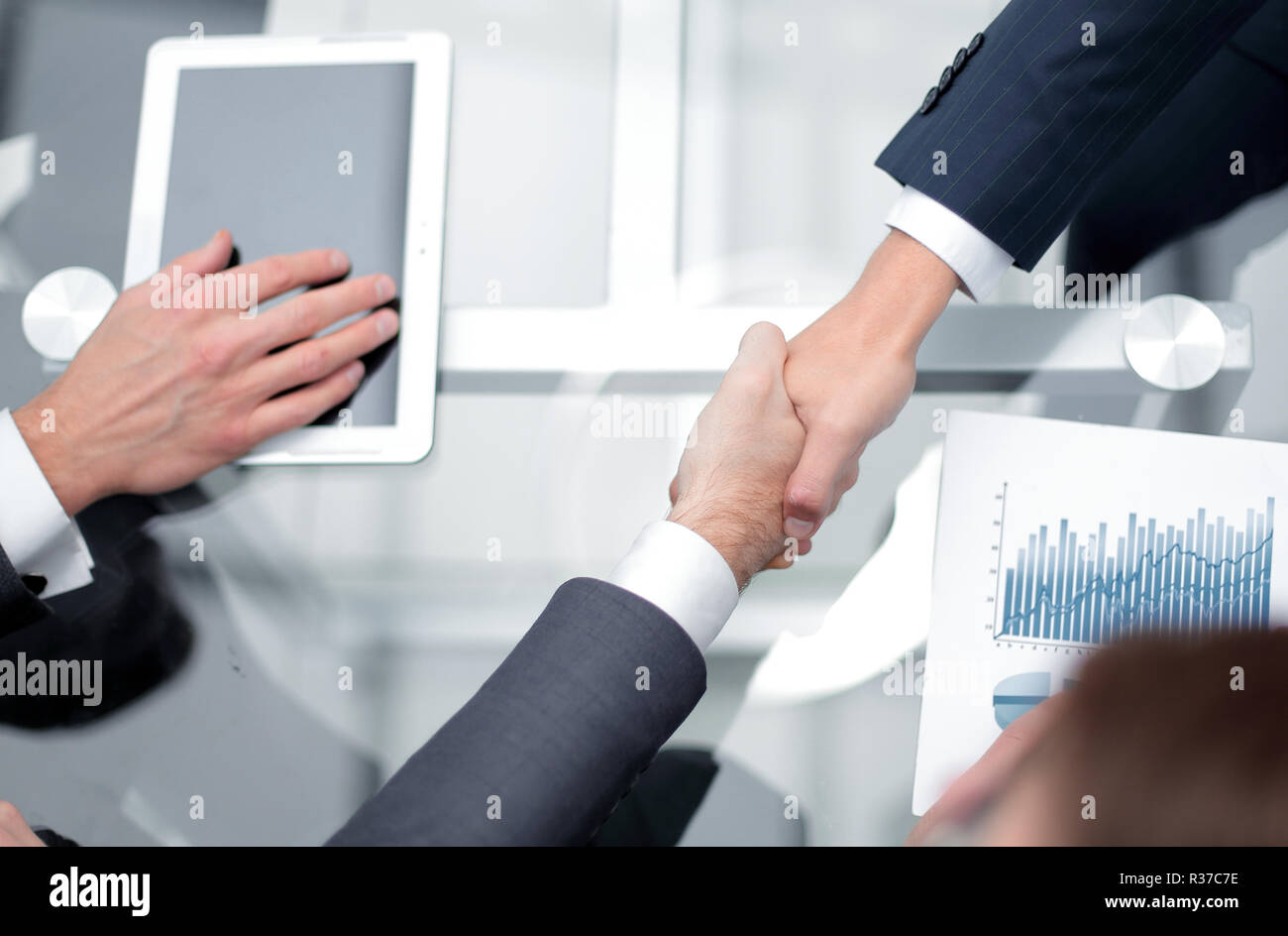 close up. investor and businessman shaking hands Stock Photo - Alamy