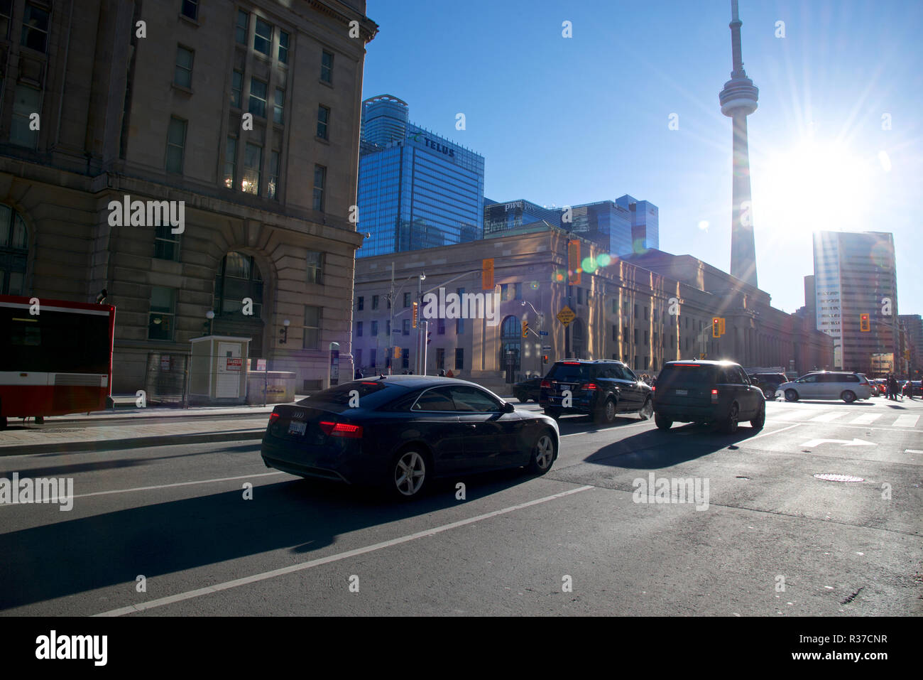 Downtown traffic in a busy street corner Stock Photo - Alamy