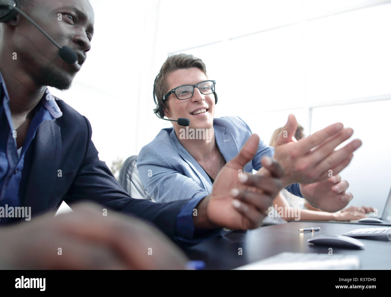 operators of the call center discussing operational issues Stock Photo ...
