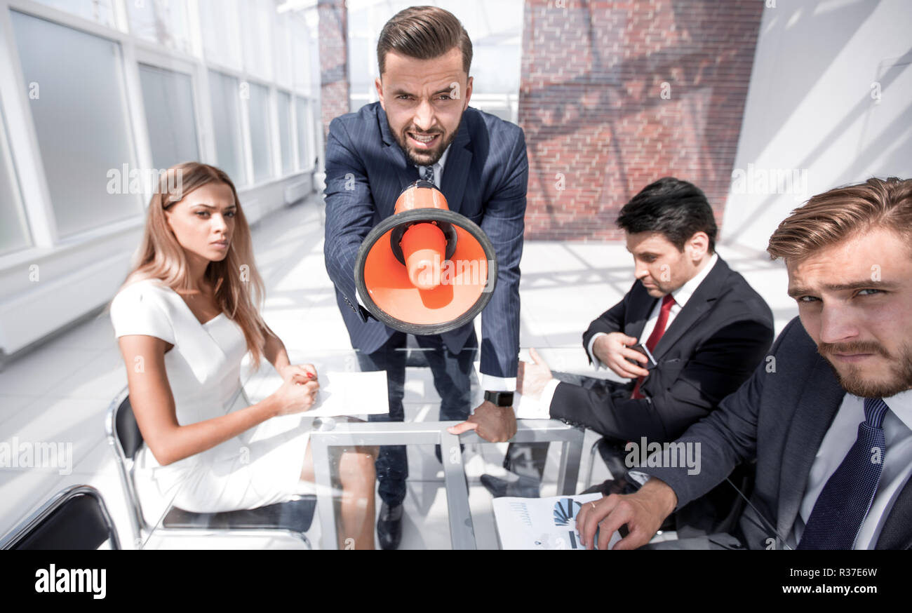 angry boss with megaphone at work meeting Stock Photo - Alamy