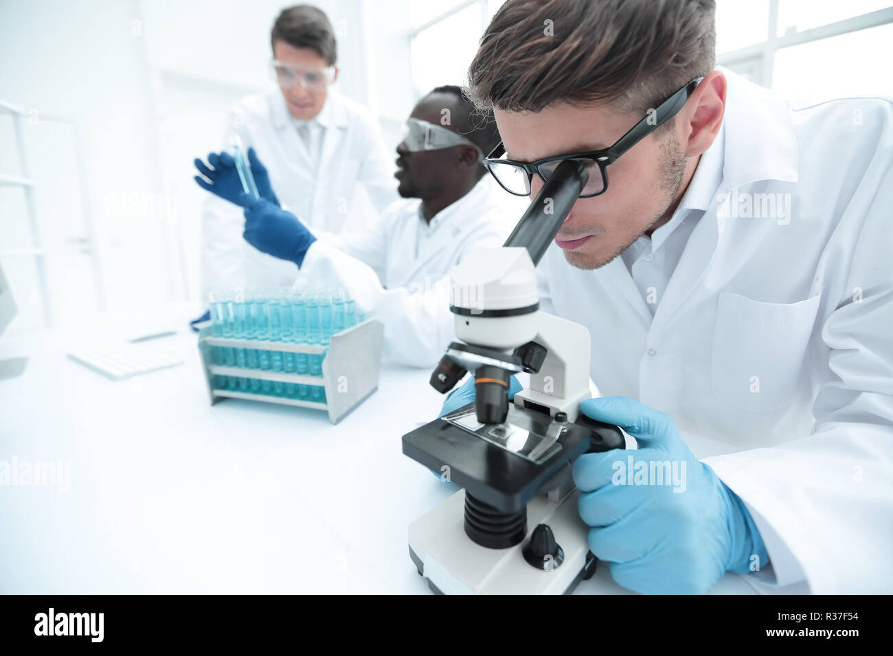 close up.the scientist uses a microscope for research Stock Photo - Alamy
