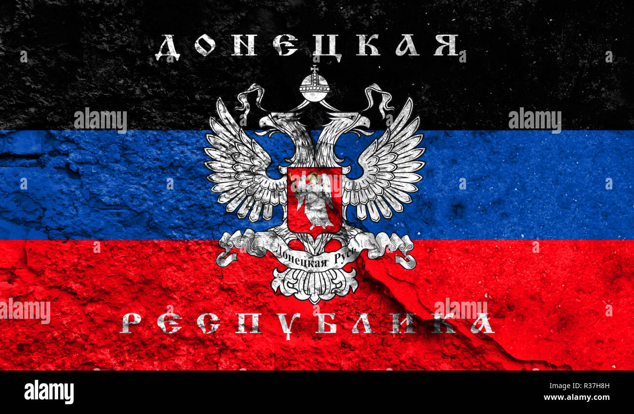 Flag of the Donetsk People's Republic close up painted on a cracked ...
