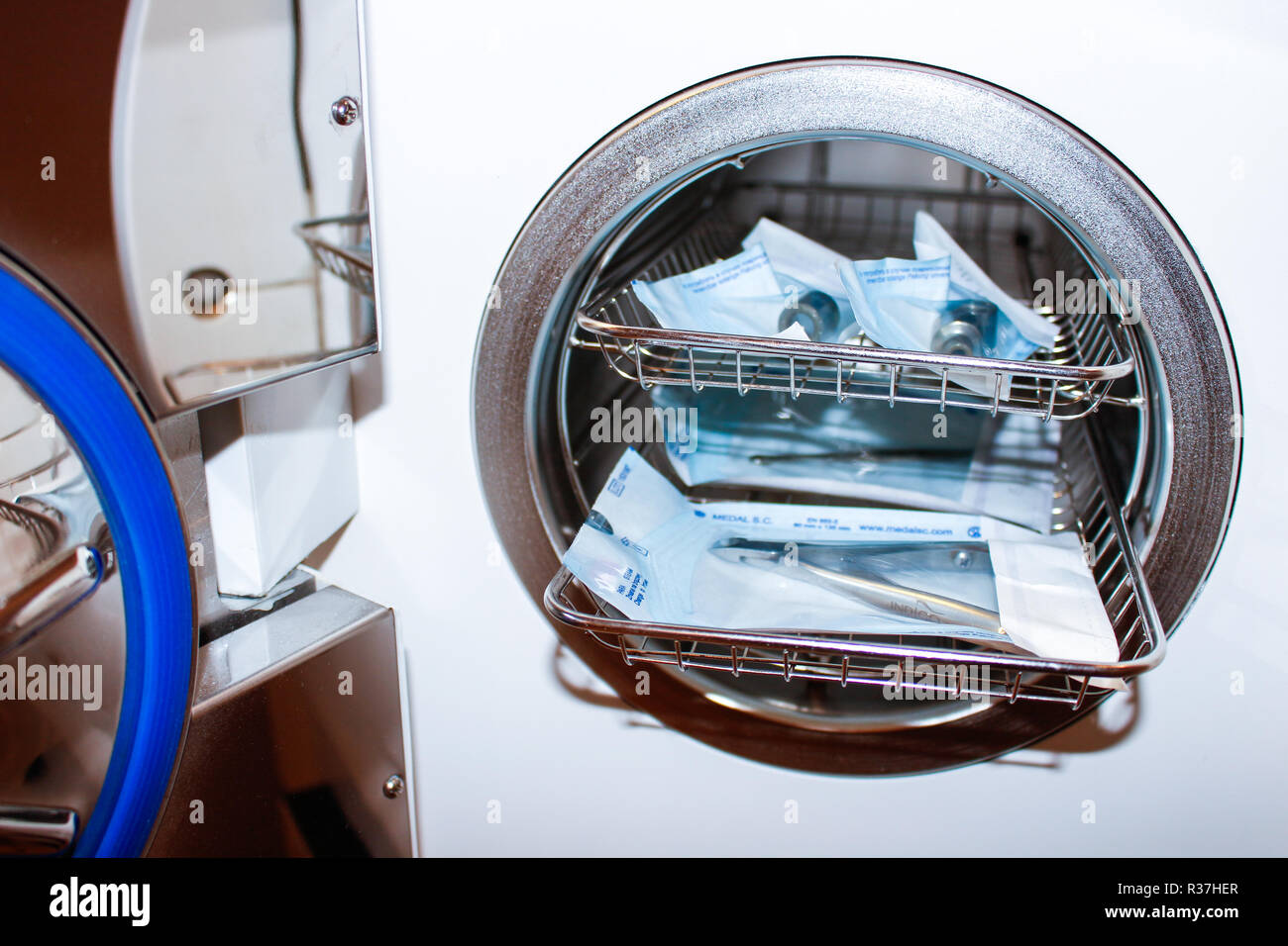 Sterilizing medical instruments in autoclave. Equipment for sterile ...