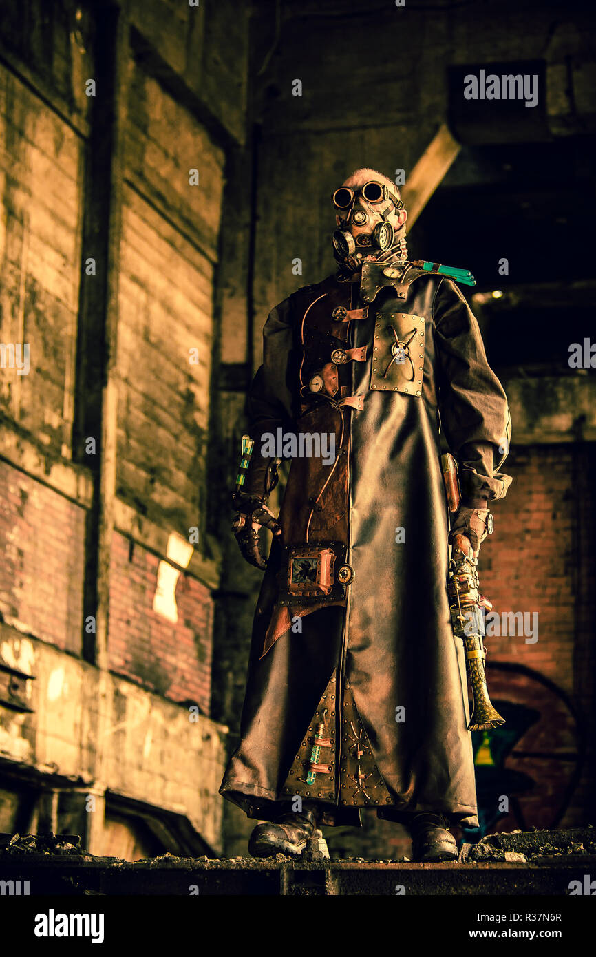 Steampunk man stands guard Stock Photo - Alamy
