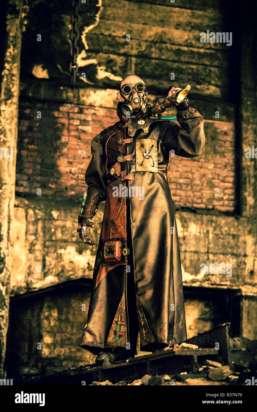 Steampunk man stands guard Stock Photo - Alamy