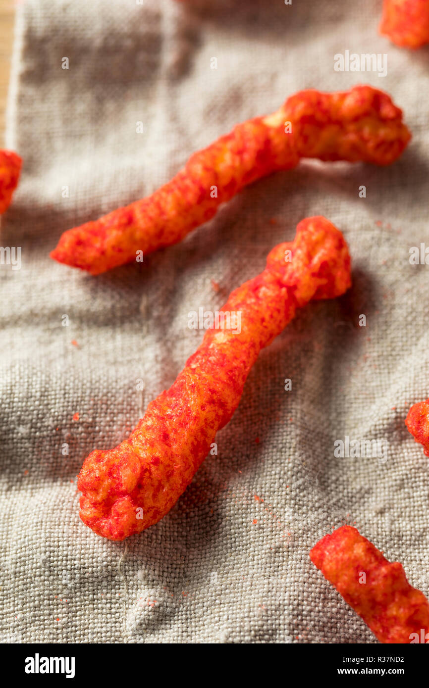 Unhealthy Spicy Cheese Corn Crisps Chips Ready to Eat Stock Photo - Alamy