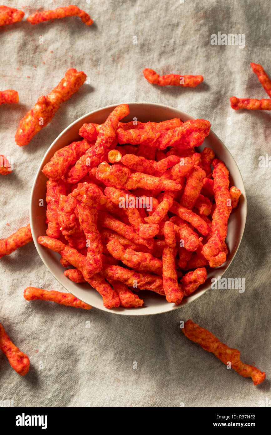 Unhealthy Spicy Cheese Corn Crisps Chips Ready to Eat Stock Photo - Alamy
