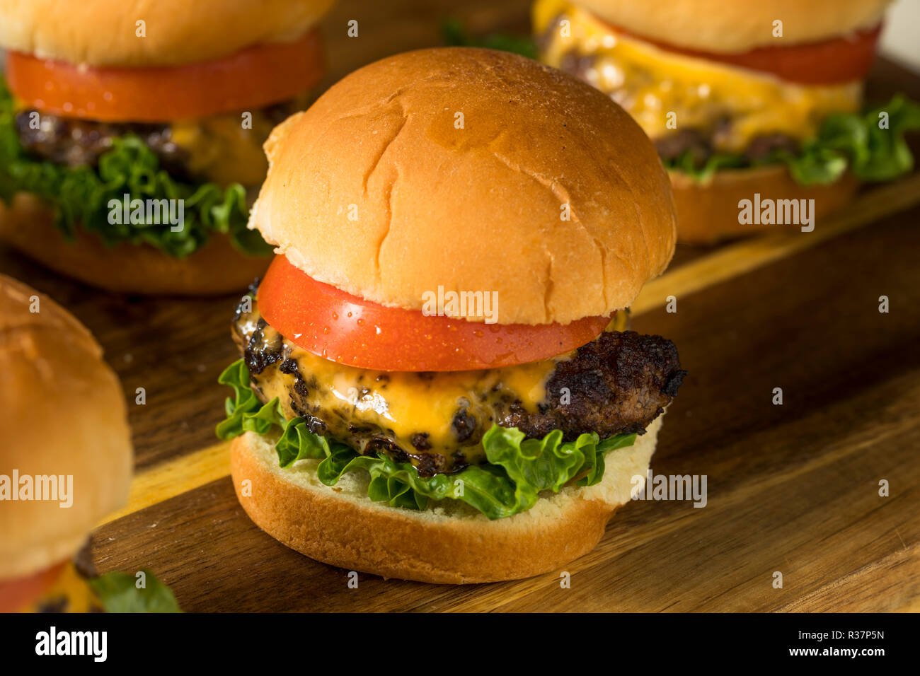 Homemade Cheeseburger Sliders with Tomato and Lettuce Stock Photo - Alamy