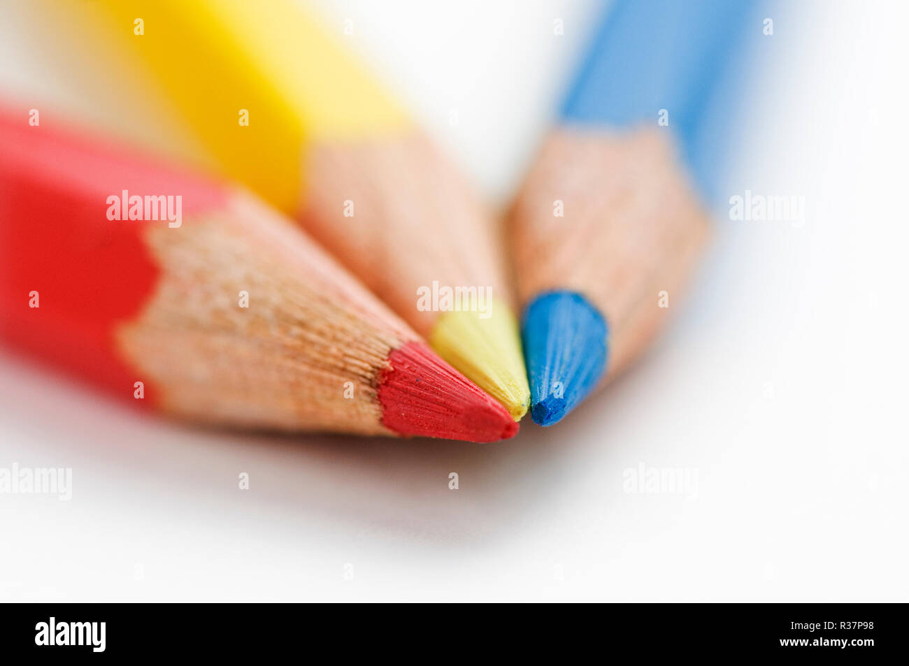 three colored pencils tips Stock Photo - Alamy