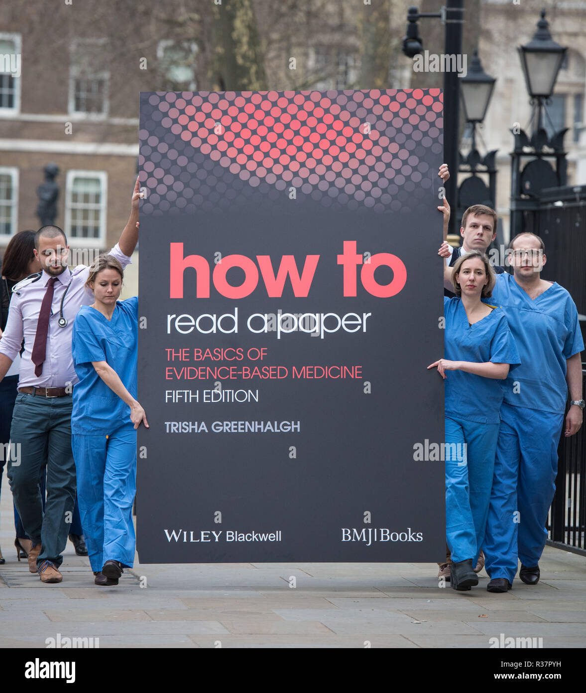 Whitehall, London, UK. 21st January, 2016. Doctors wearing scrubs carry ...