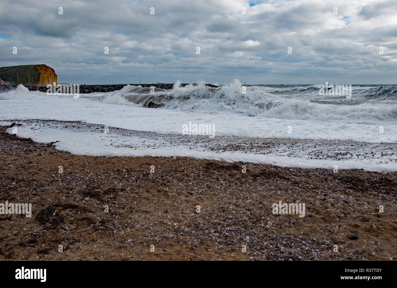 Choppy seas on West Bay beach Stock Photo - Alamy