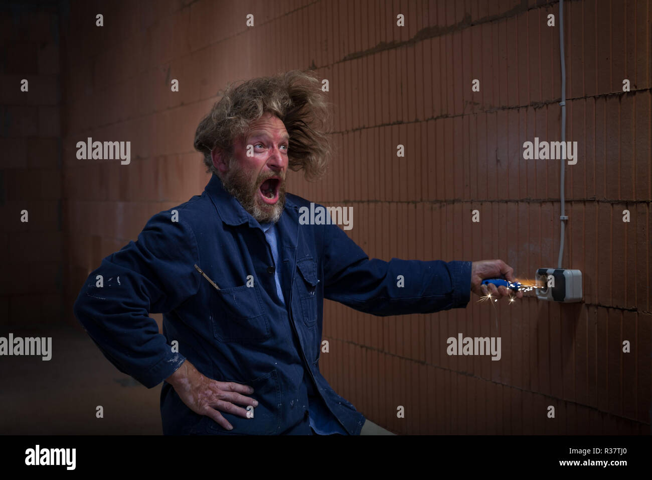 Electric shock man hi-res stock photography and images - Alamy