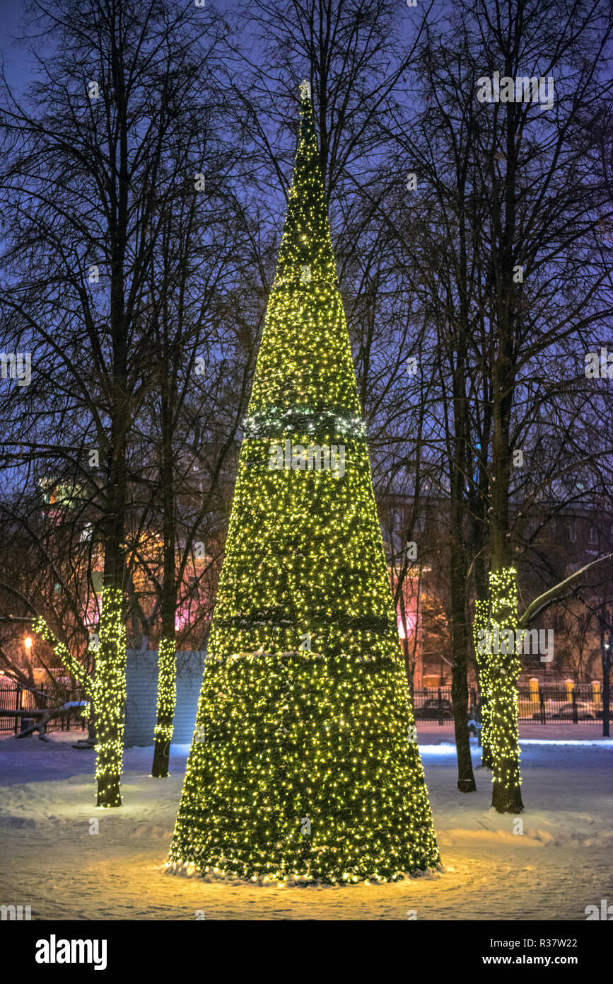 Decorative christmas tree with illumination on street Stock Photo - Alamy