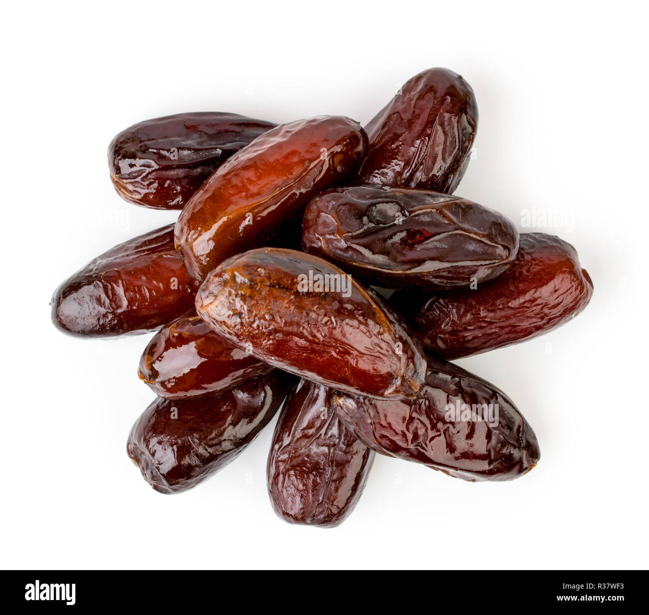 A bunch of dates on a white. The view from the top Stock Photo - Alamy