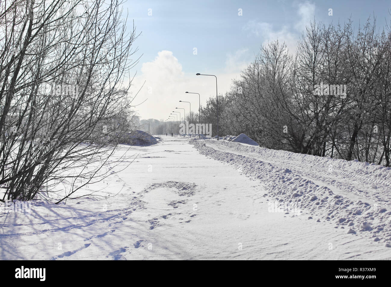 Landscape of winter road in a very high snow in capital of Latvia at ...