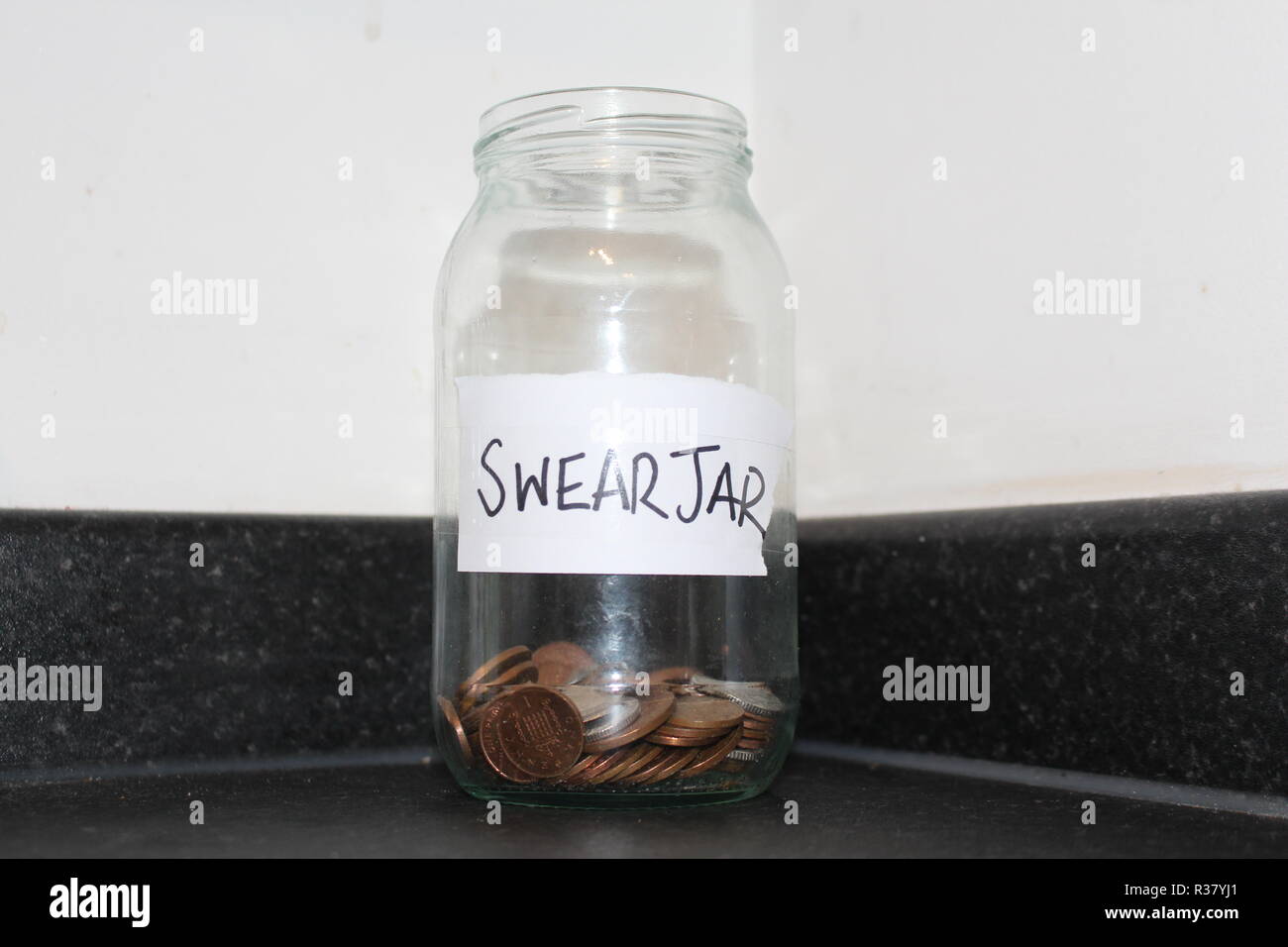 The Swear Jar Stock Photo - Alamy