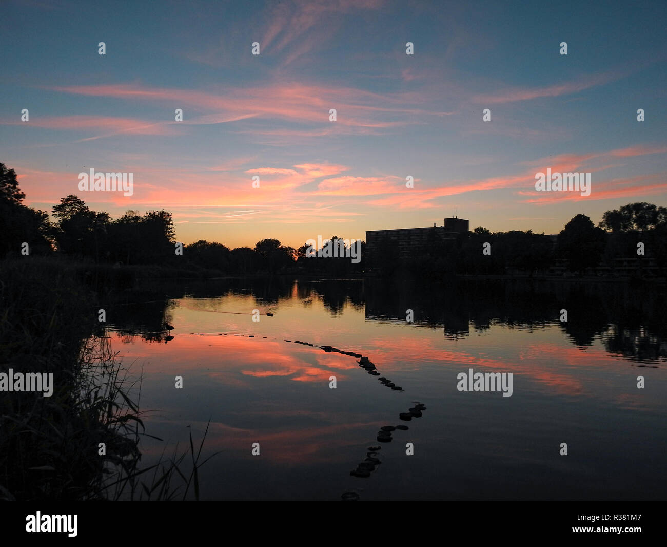 Scenic sunset over lake colorful hi-res stock photography and images ...