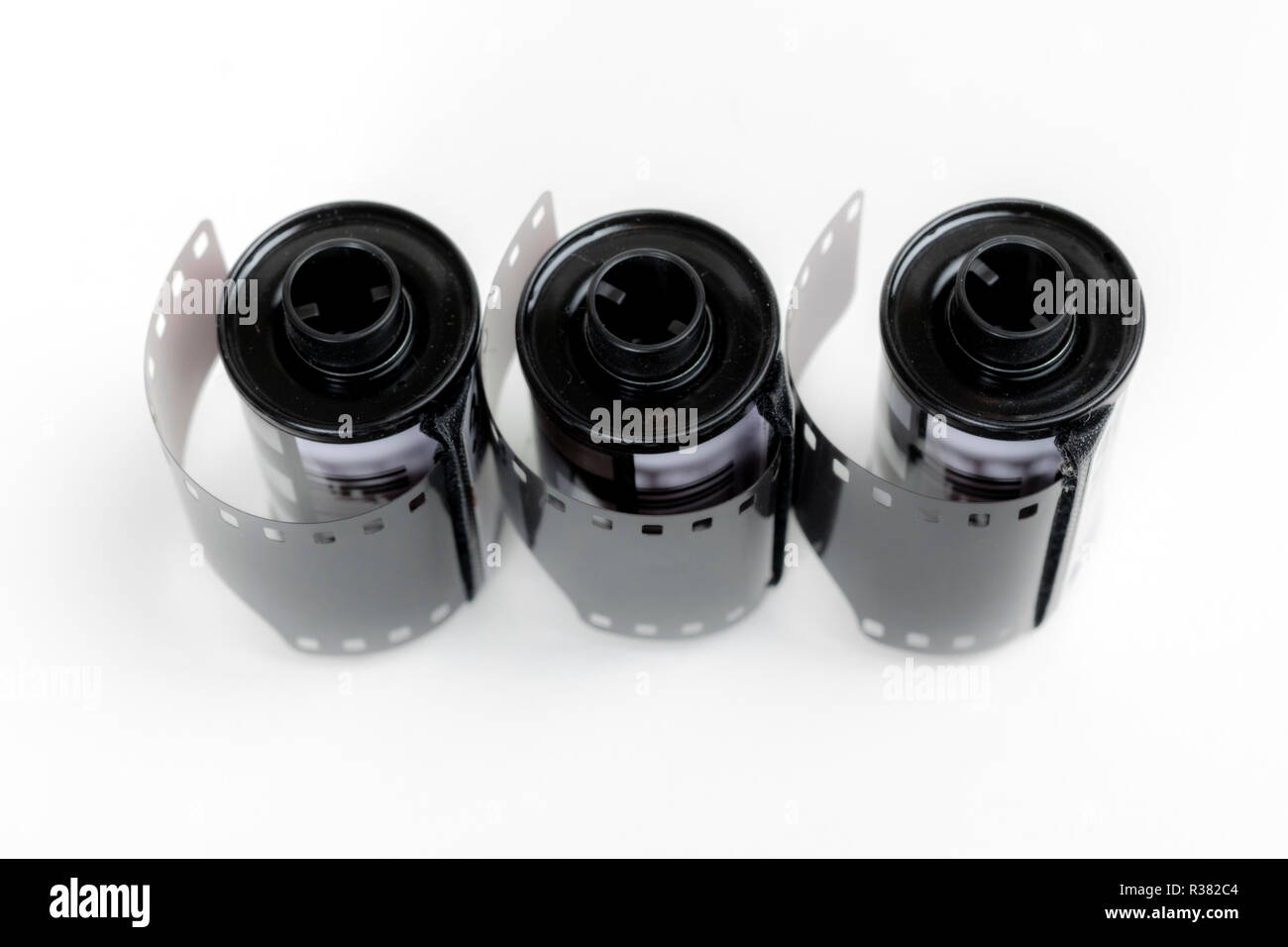 Three rolls of 35mm film Stock Photo - Alamy