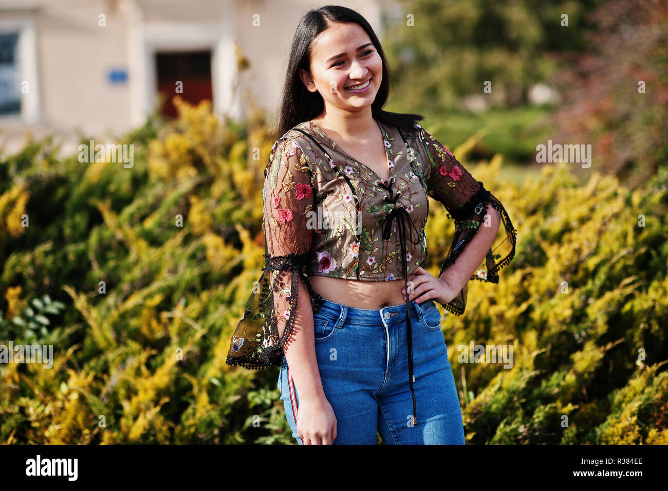 Pretty latino model girl from Ecuador wear on jeans posed at street ...