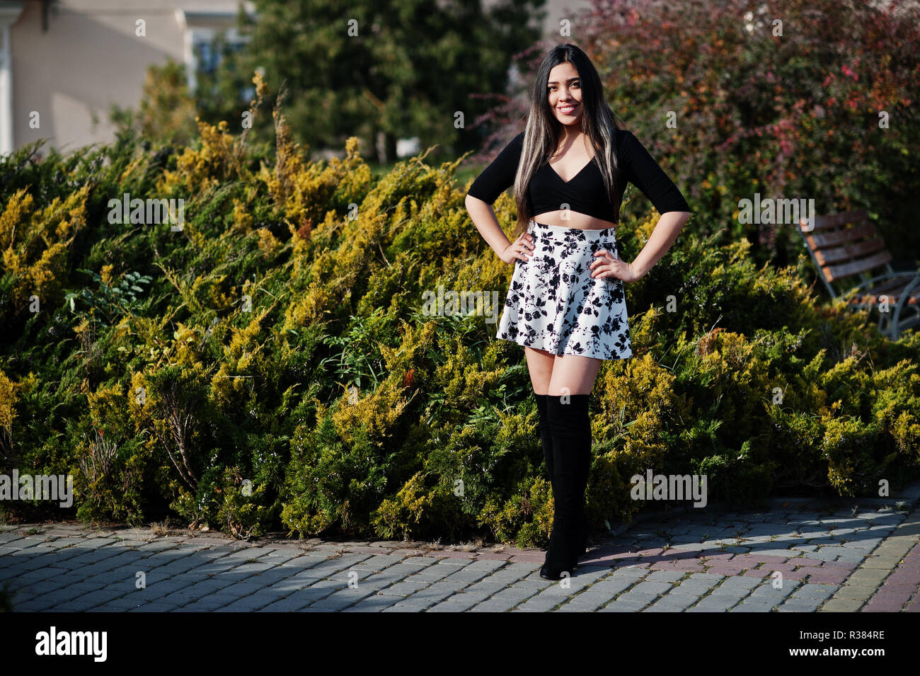 Pretty latino model girl from Ecuador wear on black tops and skirt ...