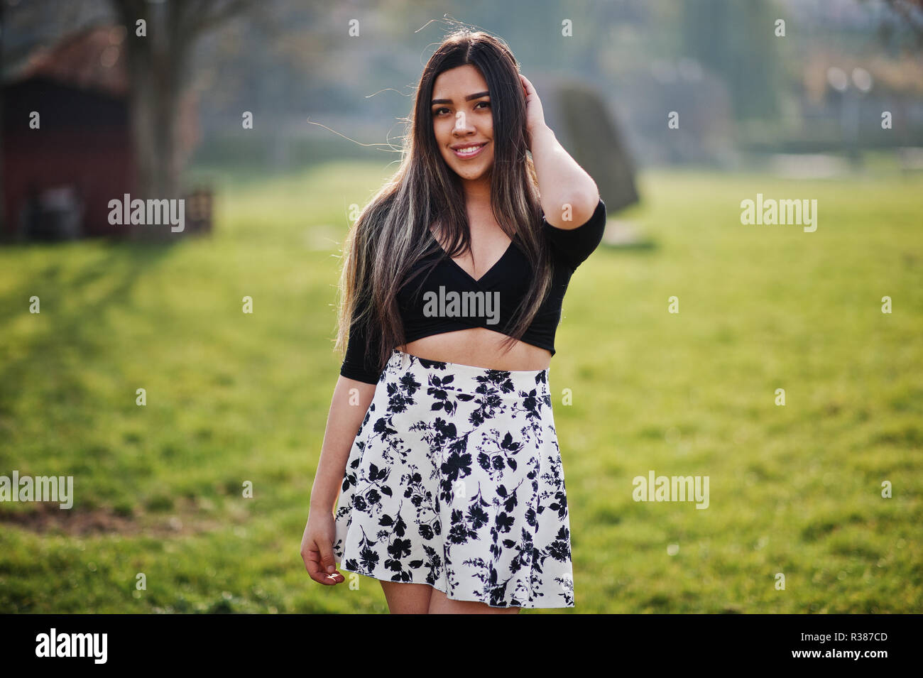 Pretty latino model girl from Ecuador wear on black tops and skirt ...