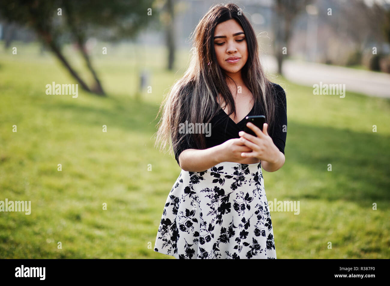 Pretty latino model girl from Ecuador wear on black tops and skirt ...