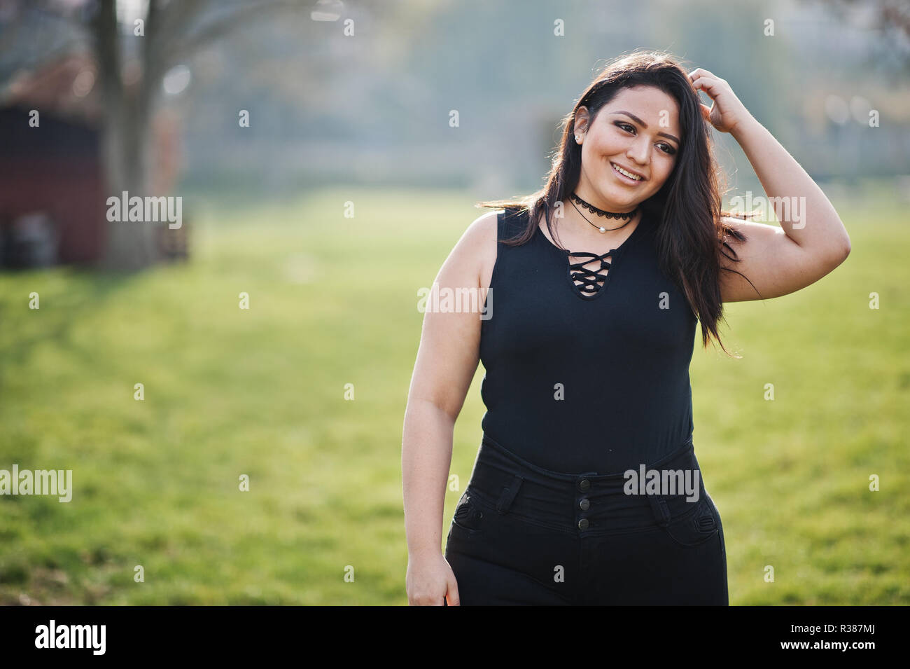 Pretty latino model girl from Ecuador wear on black posed at street ...