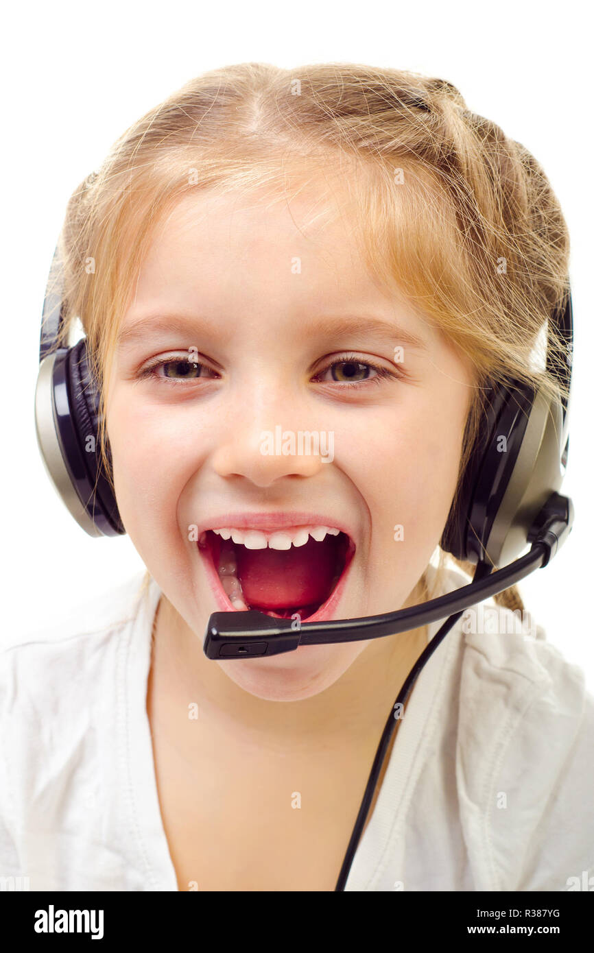 little girl with headset isolated on a white background Stock Photo - Alamy