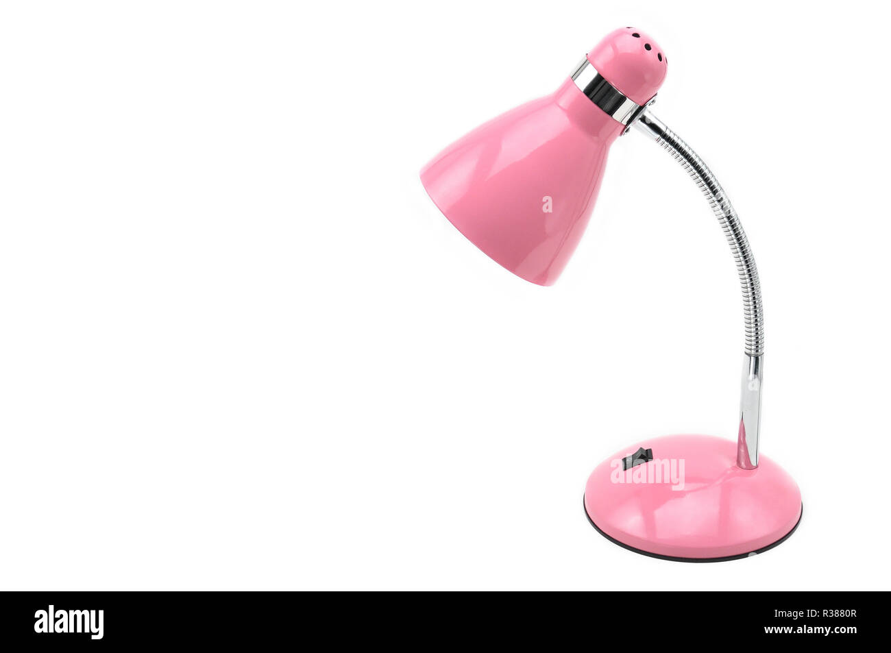 Pink colored table lamp on a white isolated background Stock Photo - Alamy