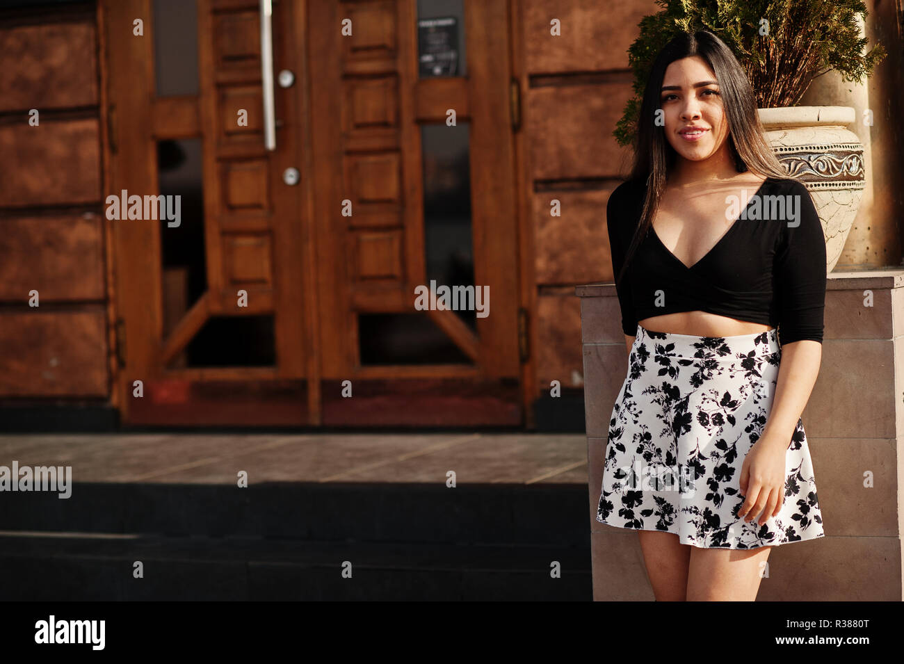 Pretty latino model girl from Ecuador wear on black tops and skirt ...