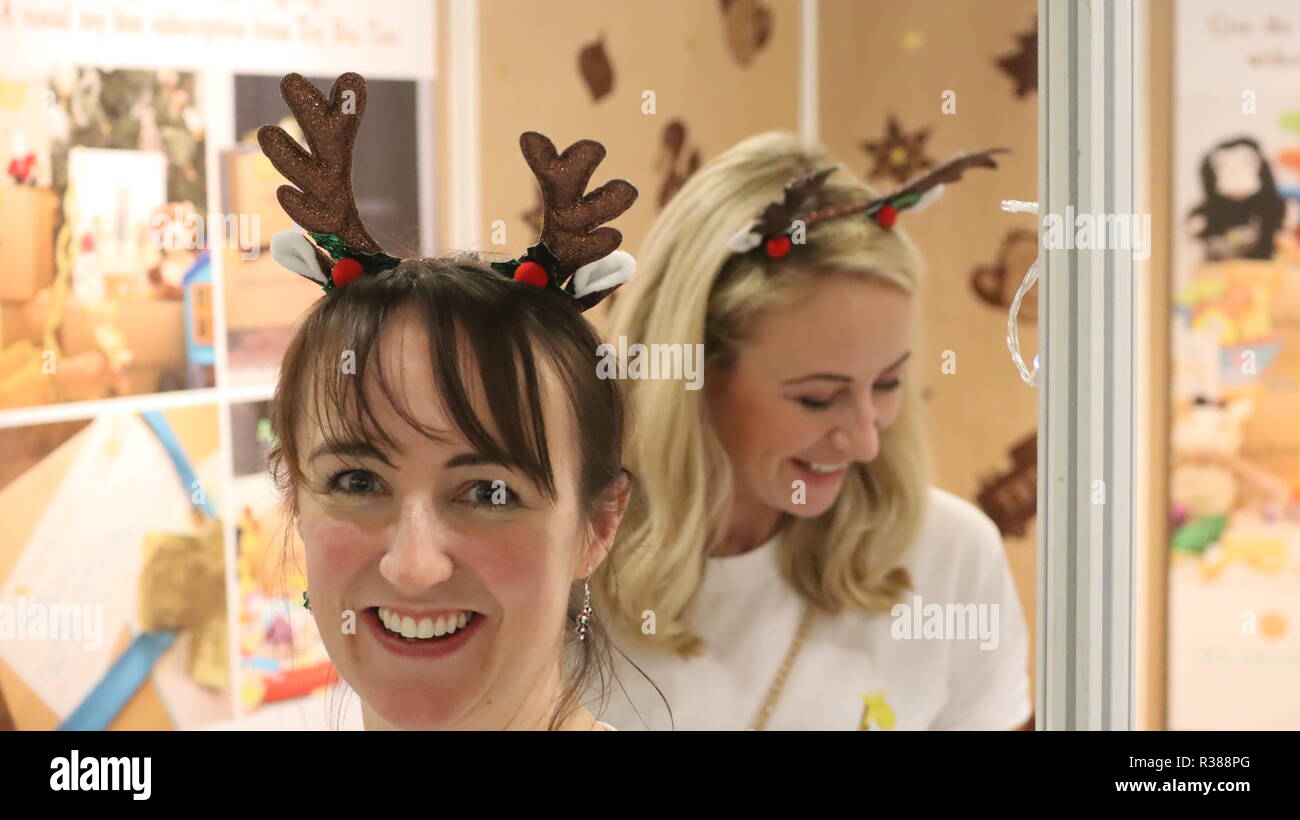 Christmas workers at Olympia Stock Photo - Alamy