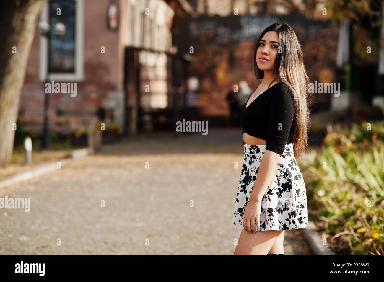Pretty latino model girl from Ecuador wear on black tops and skirt ...