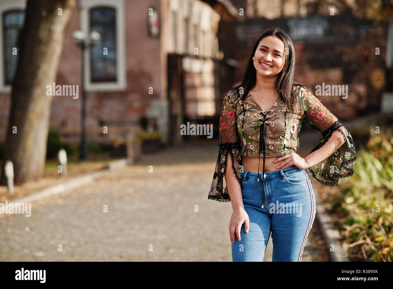 Pretty latino model girl from Ecuador wear on jeans posed at street ...