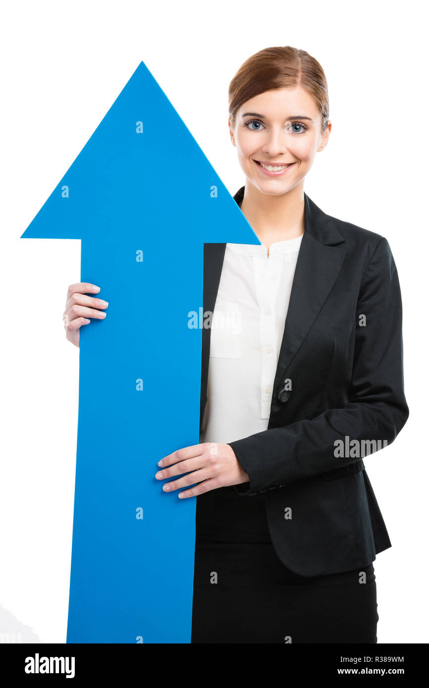 Woman holding big direction arrow hi-res stock photography and images ...