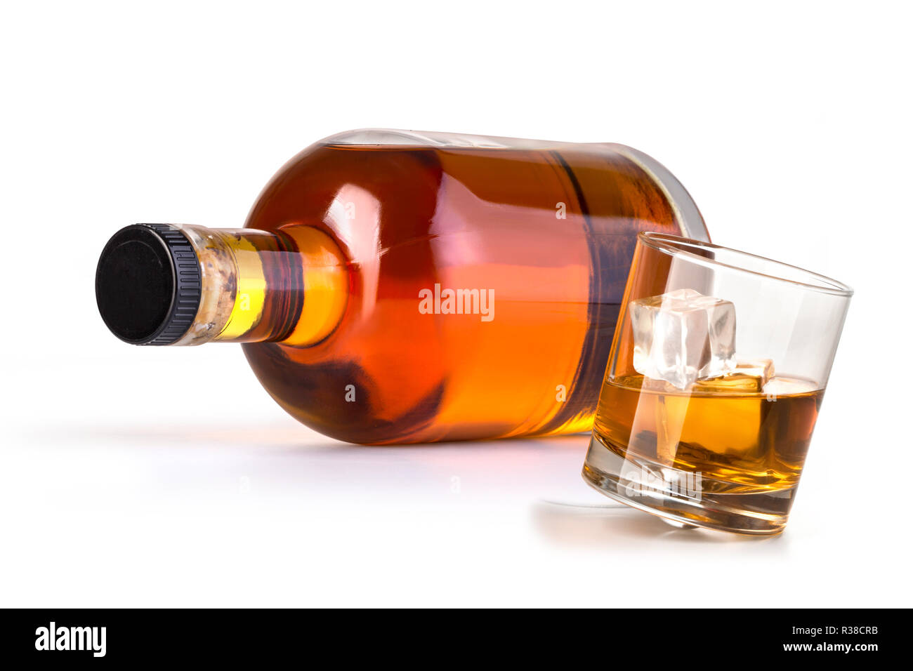 whiskey bottle with glass isolated on white background Stock Photo - Alamy