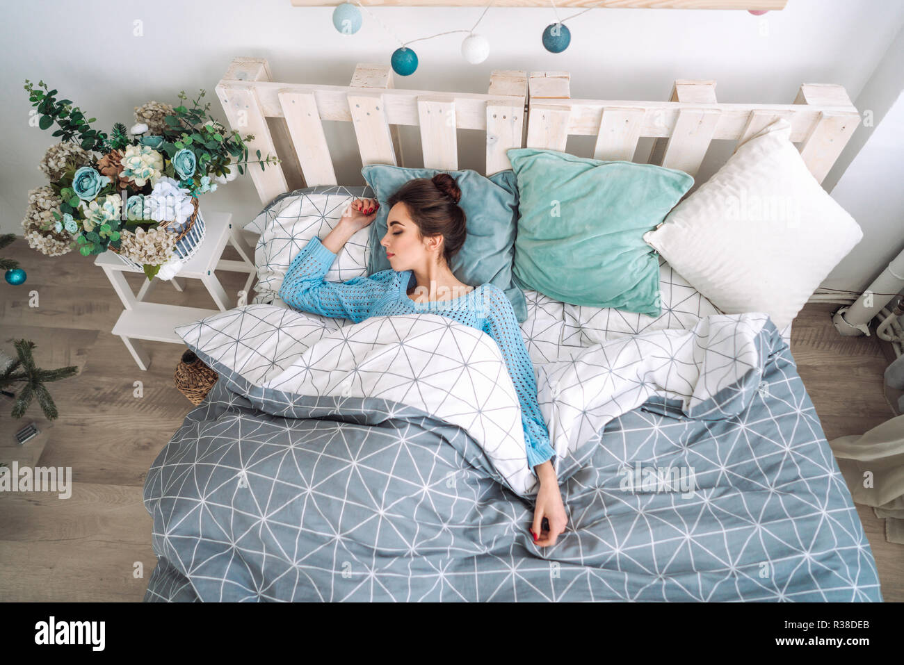 Young woman resting, sleeping in bed Stock Photo - Alamy